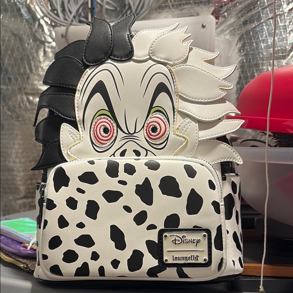 Loungefly | Bags | Loungefly Black And White Cruella Backpack | Poshmark